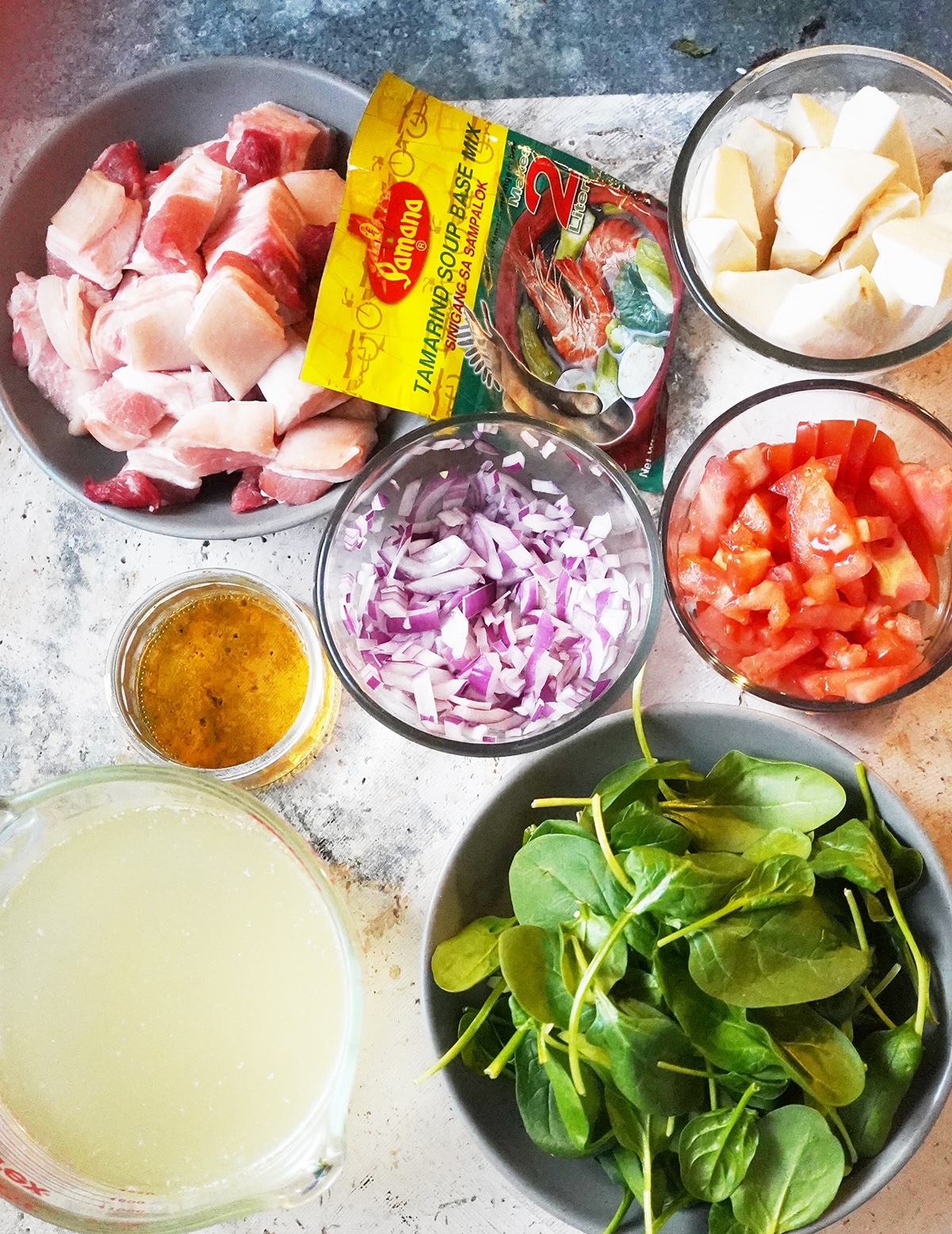Sinigang Na Pork Belly with Gabi – The Skinny Pot